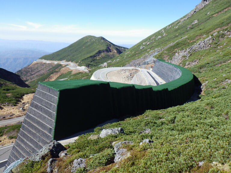 Reinforced soil protection retaining wall against rockfall; Geo Rock ...